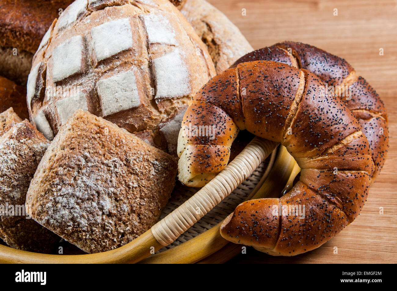 Group of different bread's type on wooden table Stock Photo - Alamy