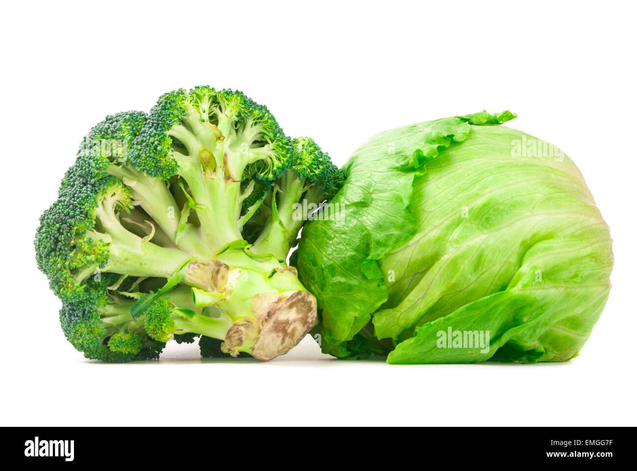 Green cabbage and broccoli isolated on white background Stock Photo - Alamy