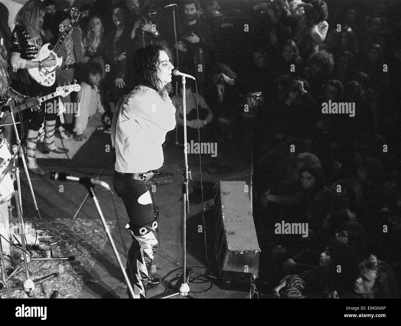 American rock singer Alice Cooper performing on stage during a concert ...