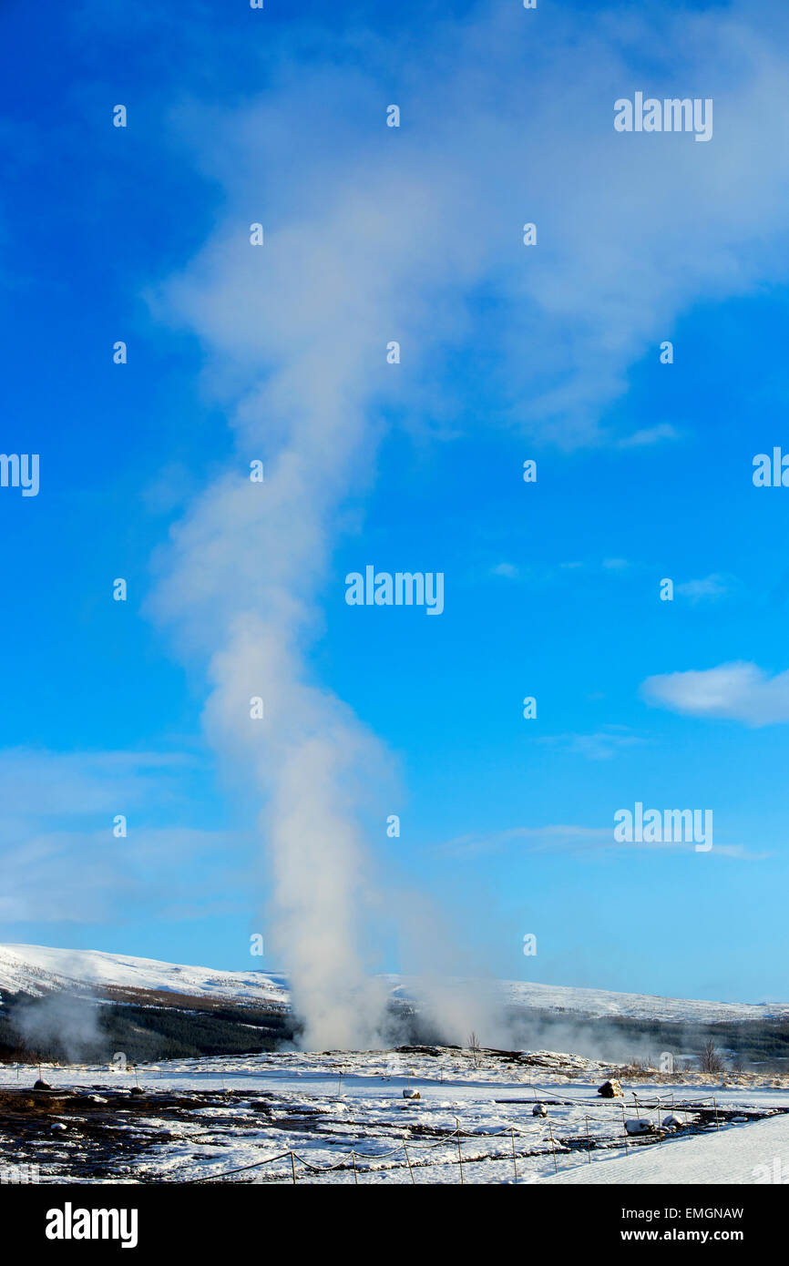 Geyser eruption of Strokkur in Iceland with blue sky in winter Stock ...