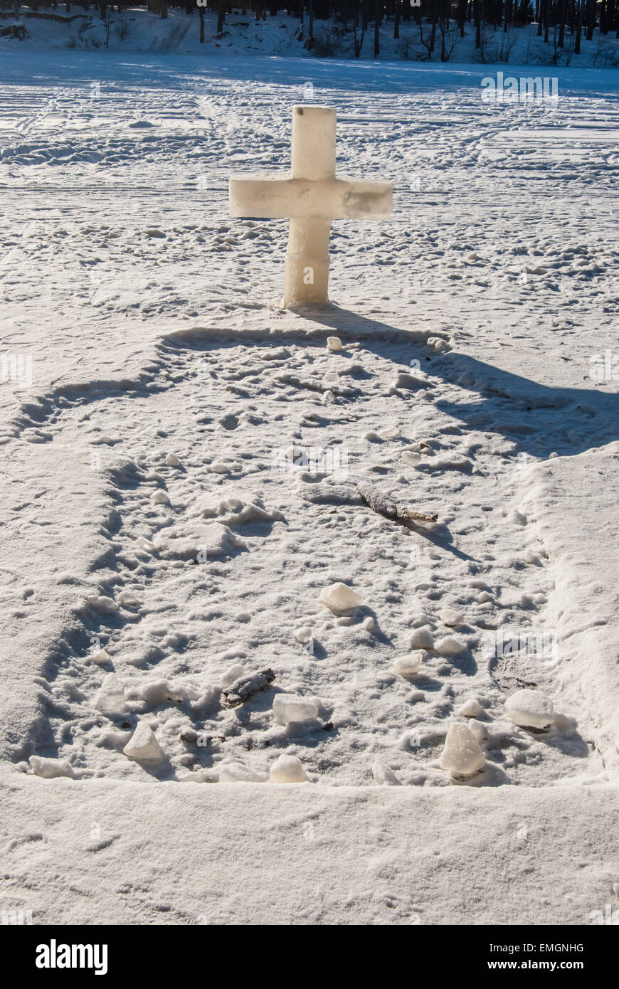 ice christian cross on frozen lake Stock Photo - Alamy