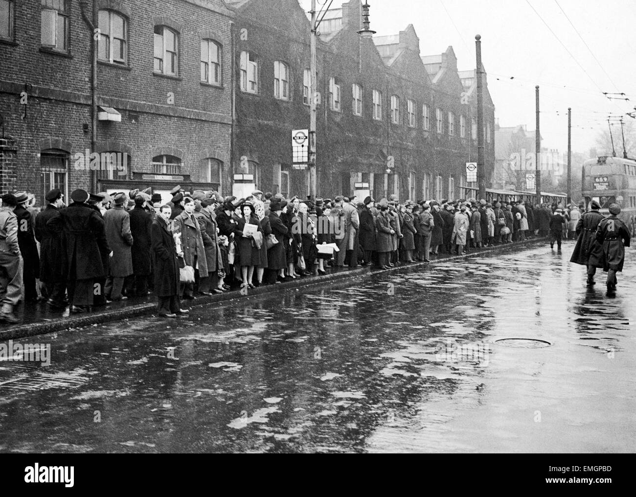 Queue for the bus Black and White Stock Photos & Images - Alamy