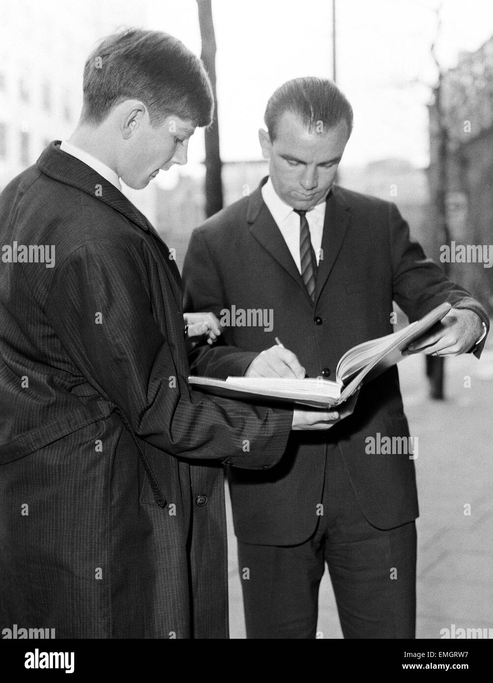 Australia in England 1964. Australian Captain Bobby Simpson signs an ...