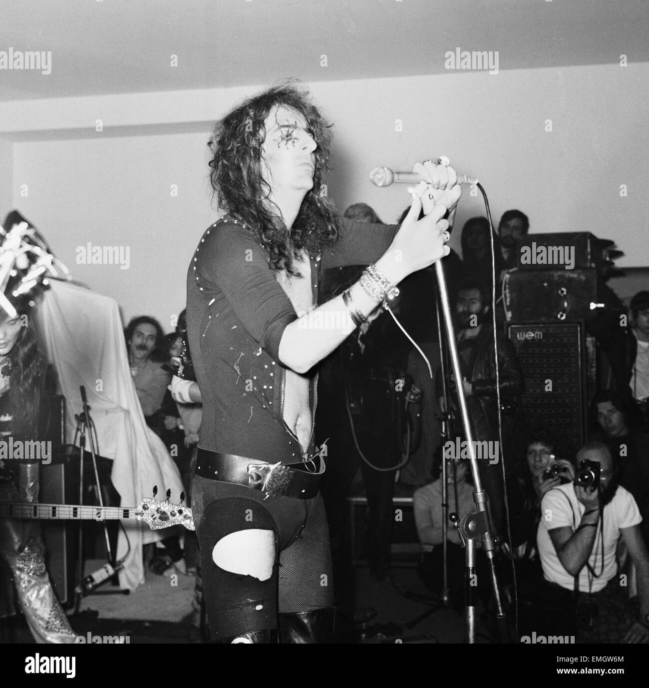 American rock singer Alice Cooper performing on stage during a concert ...