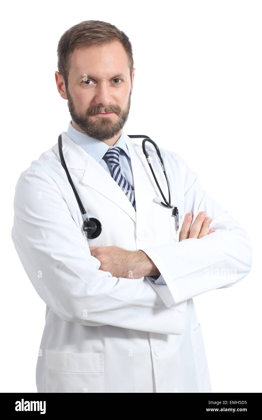 Friendly doctor man posing with folded arms isolated in a white ...