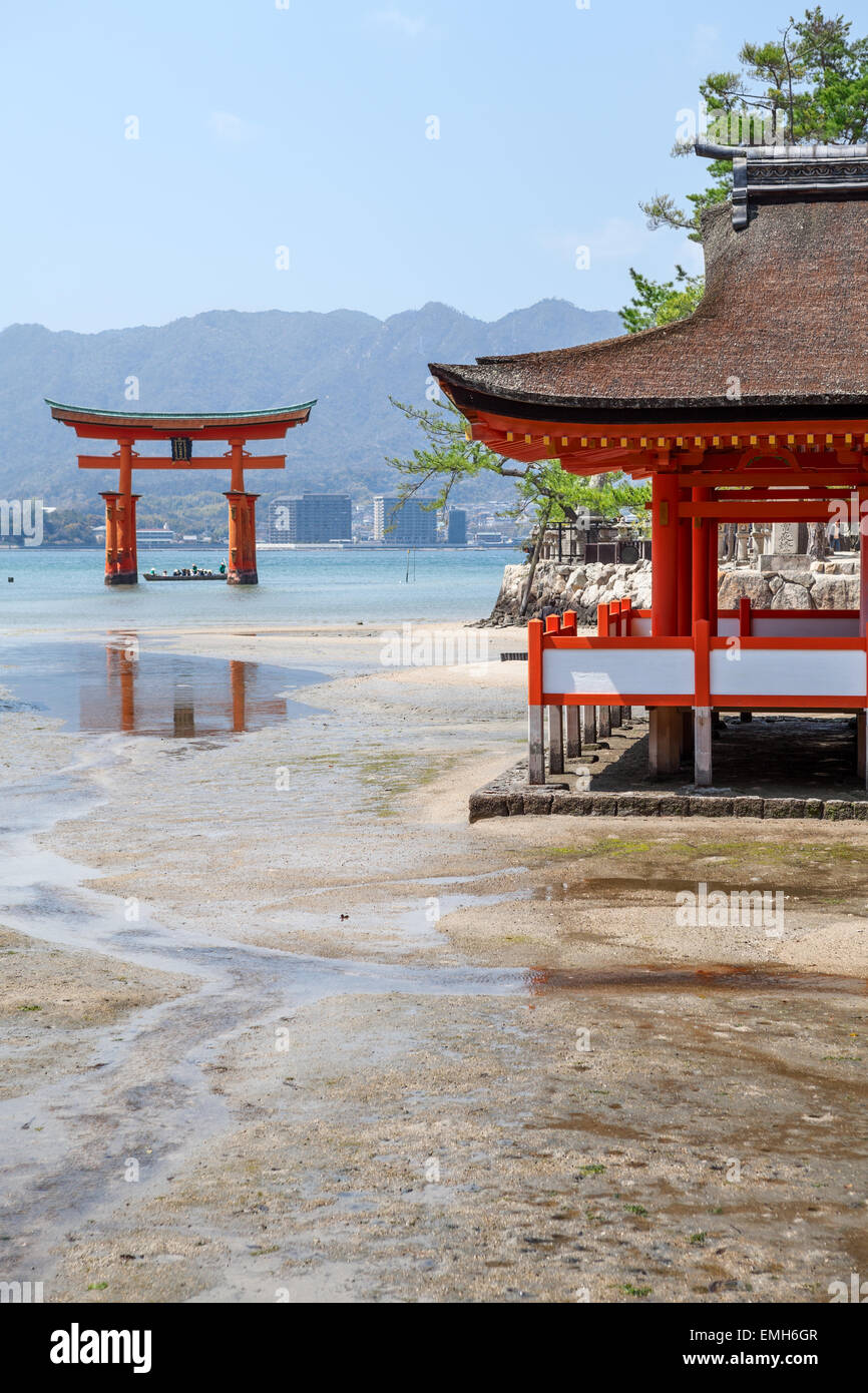Marine tide at Itsukushima Shinto shrine, the sacred red torii in ...