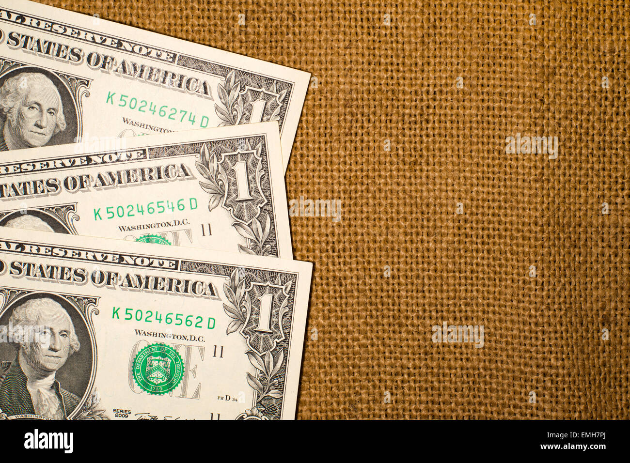 Banknotes $1 US dollars on the old sacking Stock Photo - Alamy