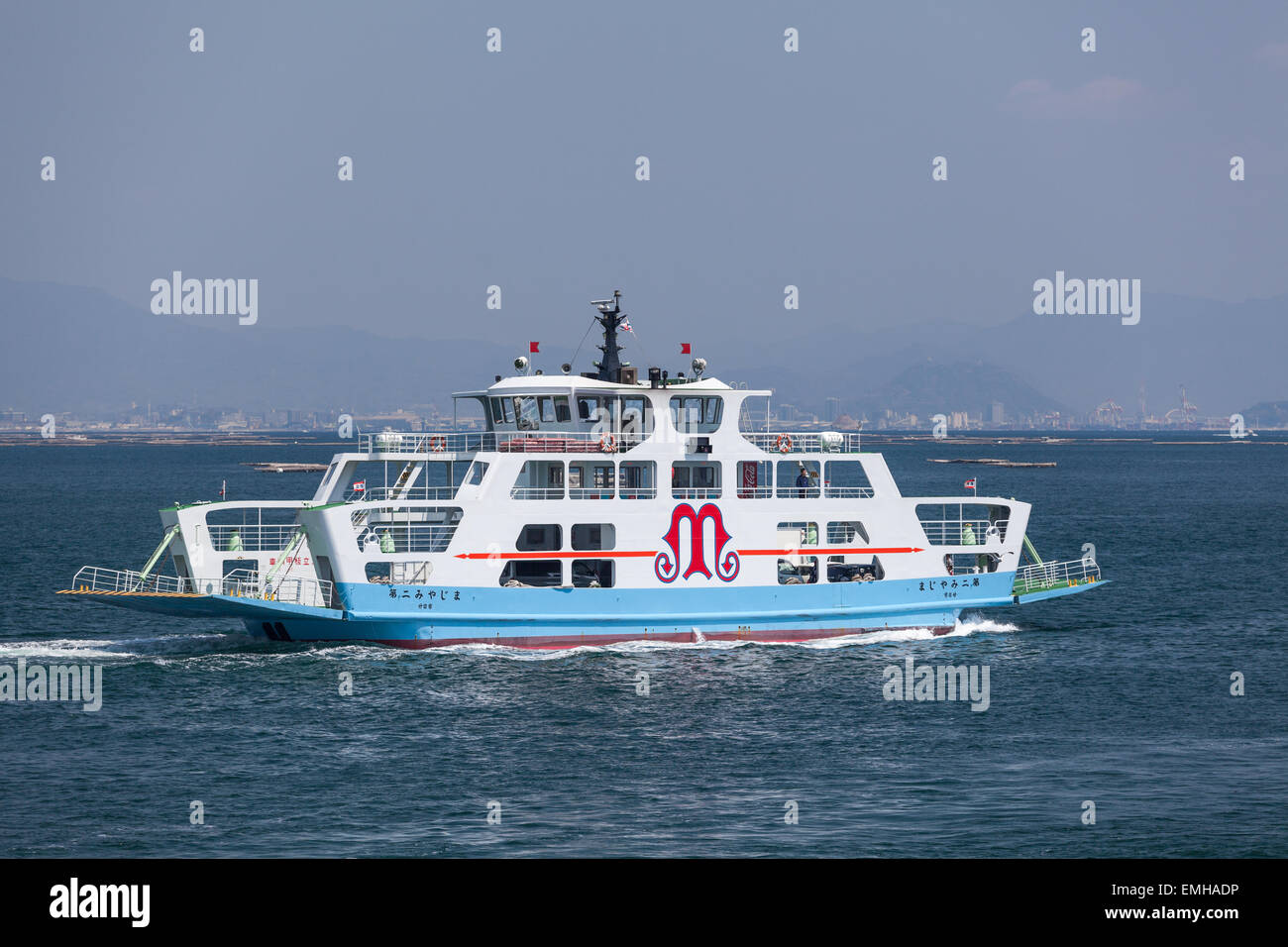 The ferry of Matsudai Kisen company comes to Miyajimaguchi town pier ...