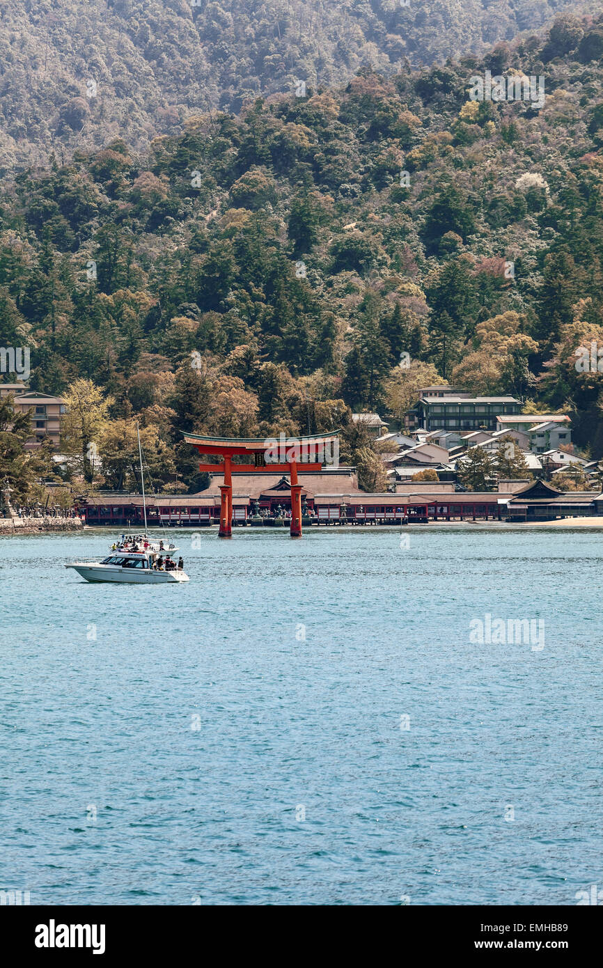 MIYAJIMA, JAPAN - CIRCA APR, 2013: Sacred Shinto red Torii and ...