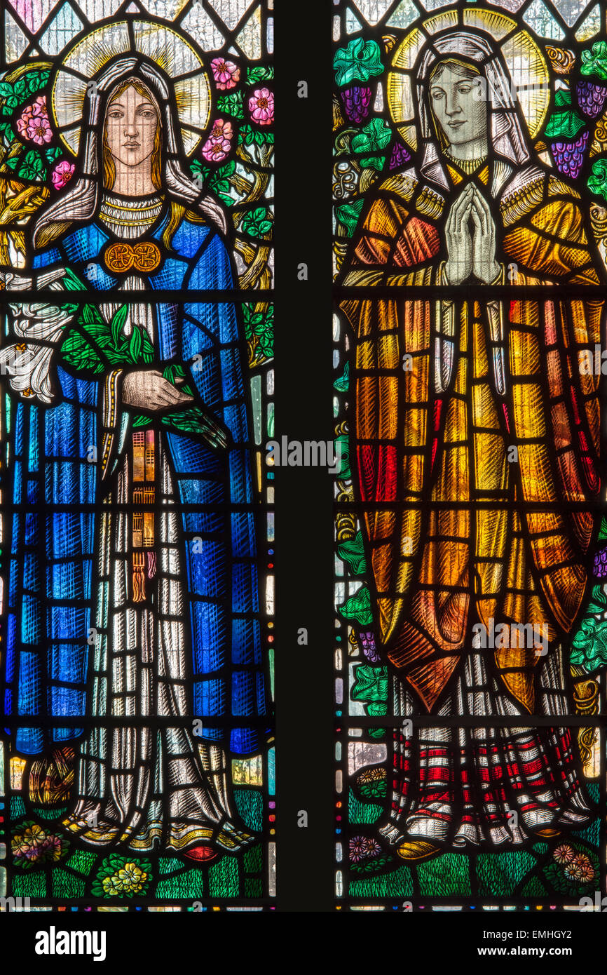 Saints Mary and Anne depicted in colourful stained glass in Ambleside ...