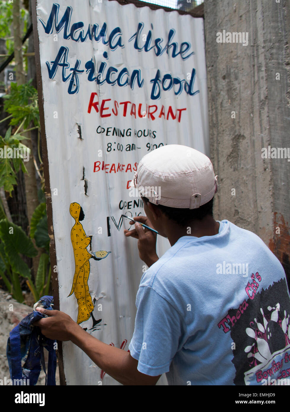 African man painting door hi-res stock photography and images - Alamy