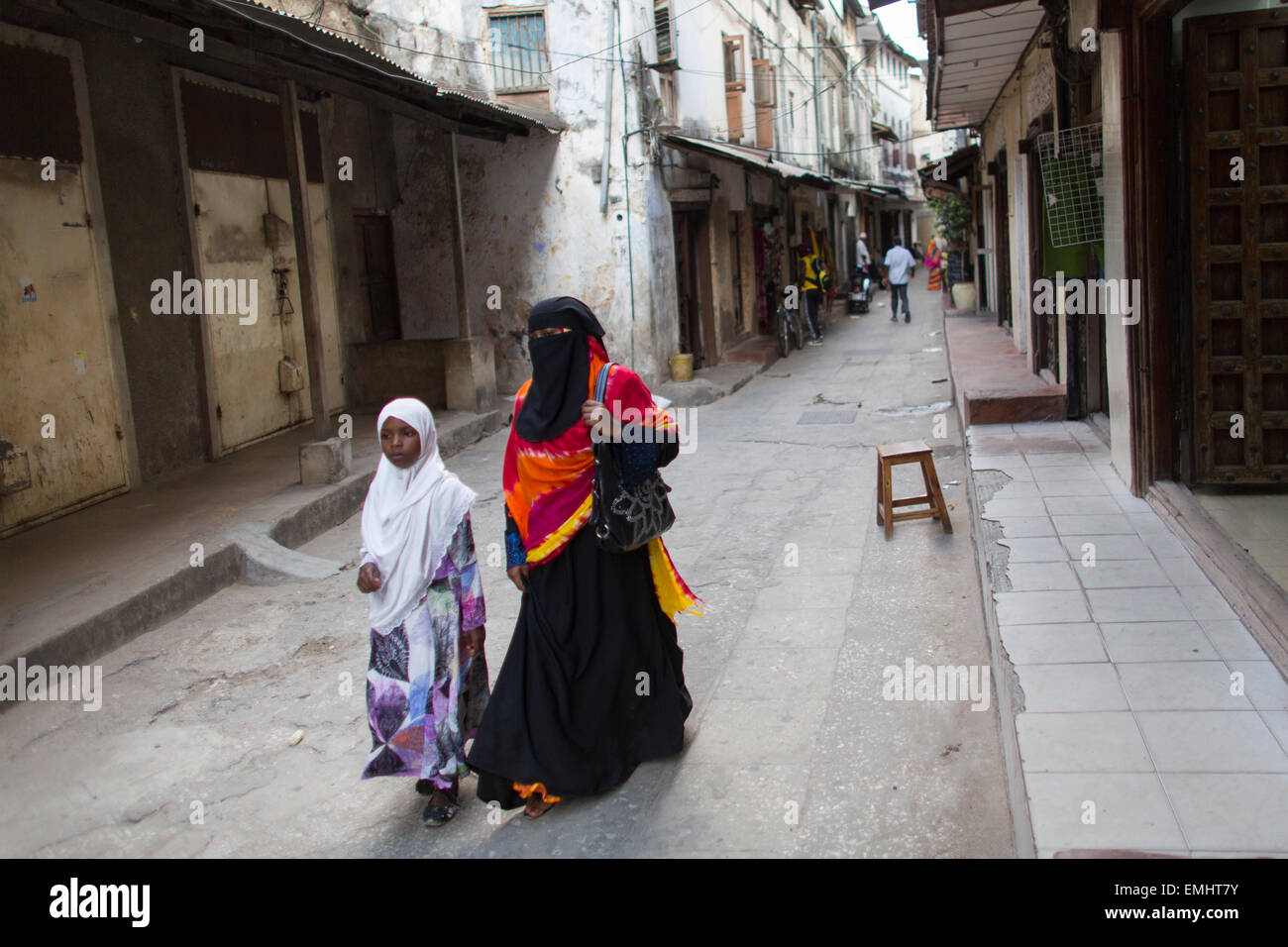 women in traditional dresses in Zanzibar Stock Photo - Alamy