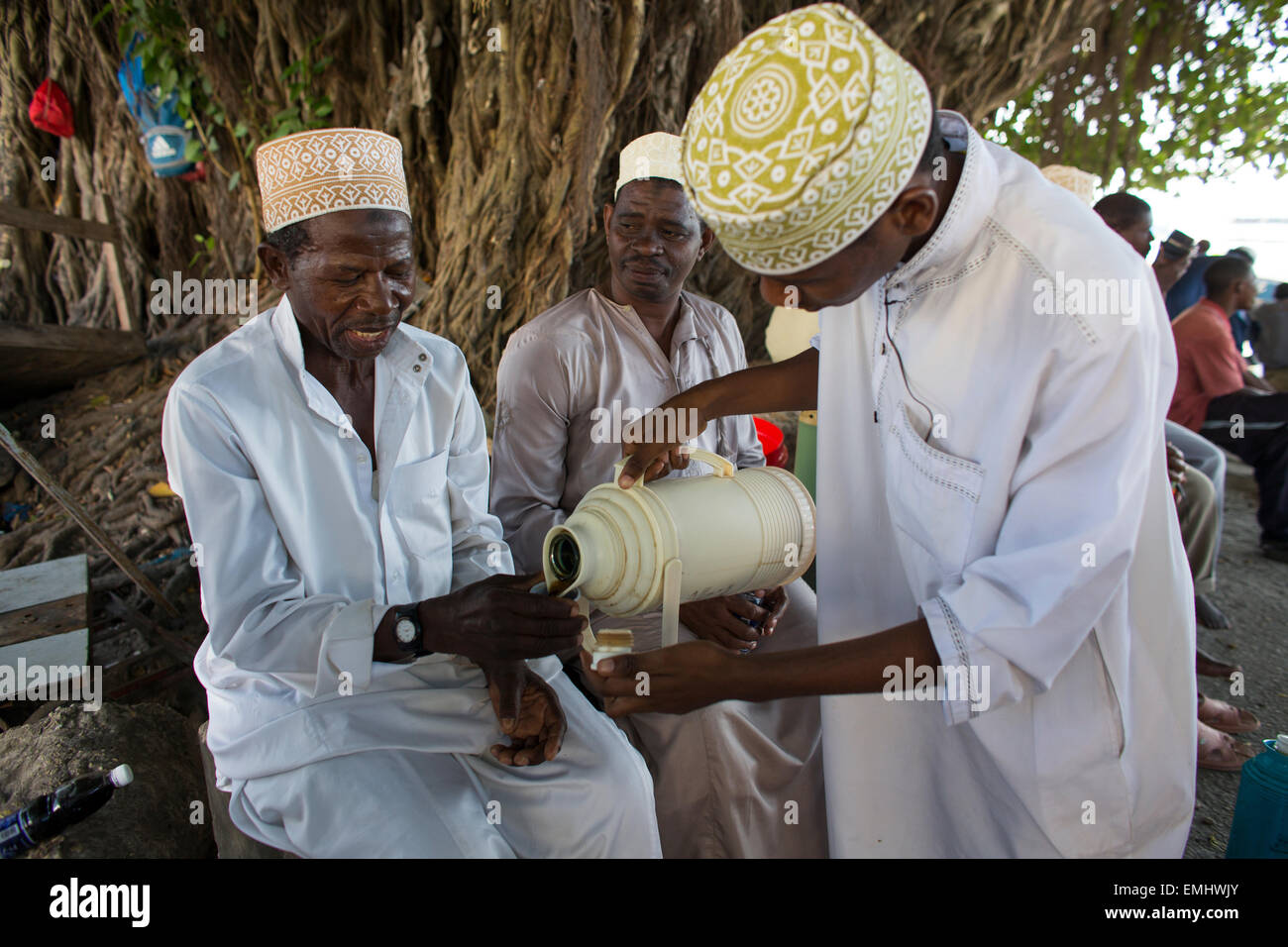 men socialising in Zanzibar Stock Photo - Alamy