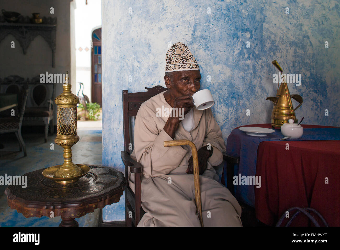 old man drinking coffee in zanzibar Stock Photo - Alamy
