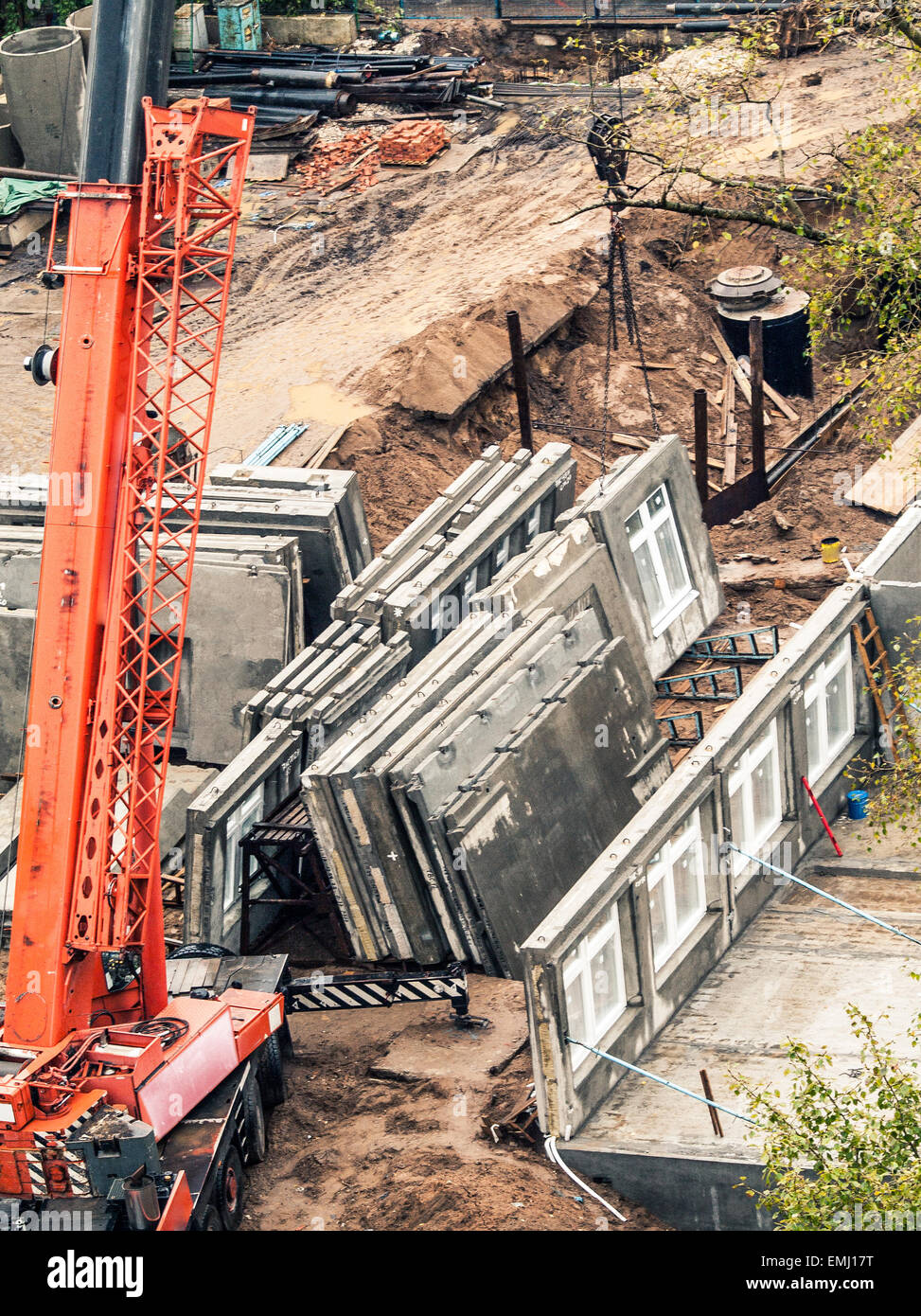 Crane lifting construction materials at site hi-res stock photography ...