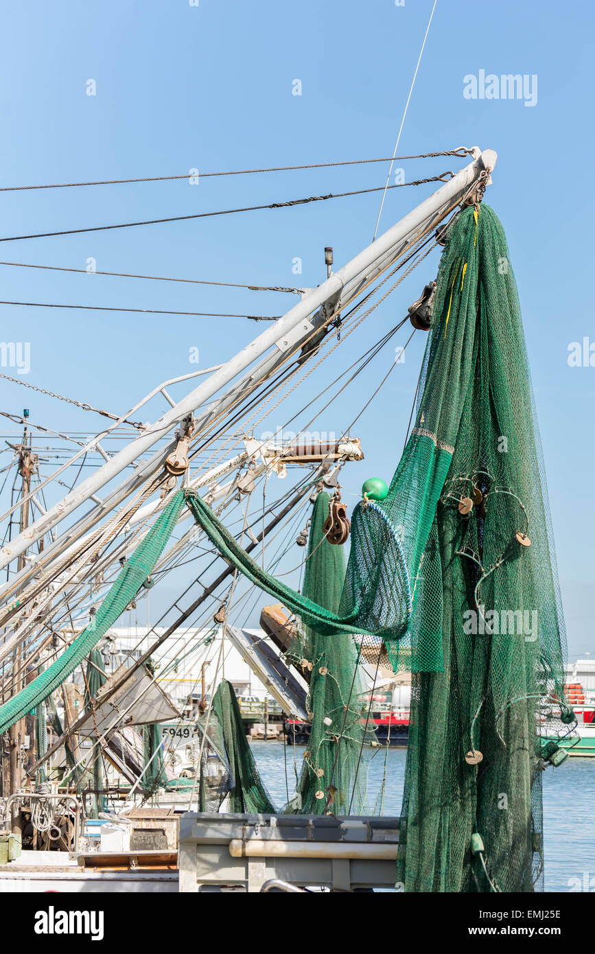 commercial fishing boats with nets at the ocean marina docks Stock ...