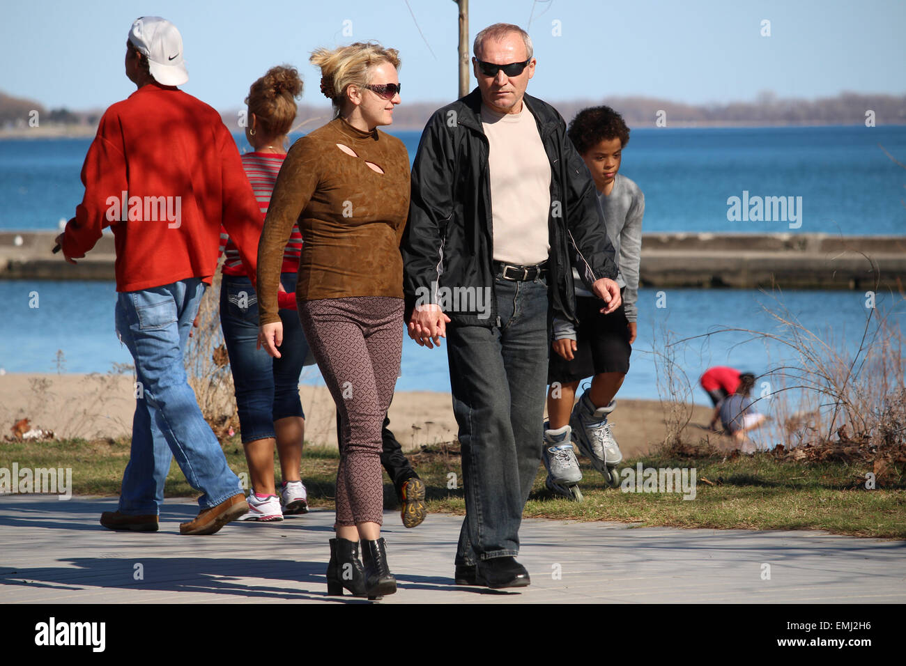 People taking a stroll on the boardwalk in Toronto Stock Photo - Alamy