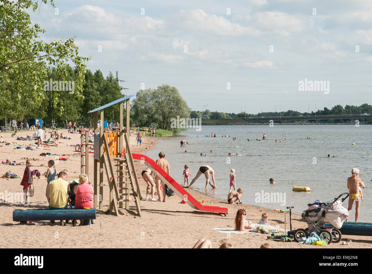 Summer beach full of people bathing on the Emajogi river on a nice ...