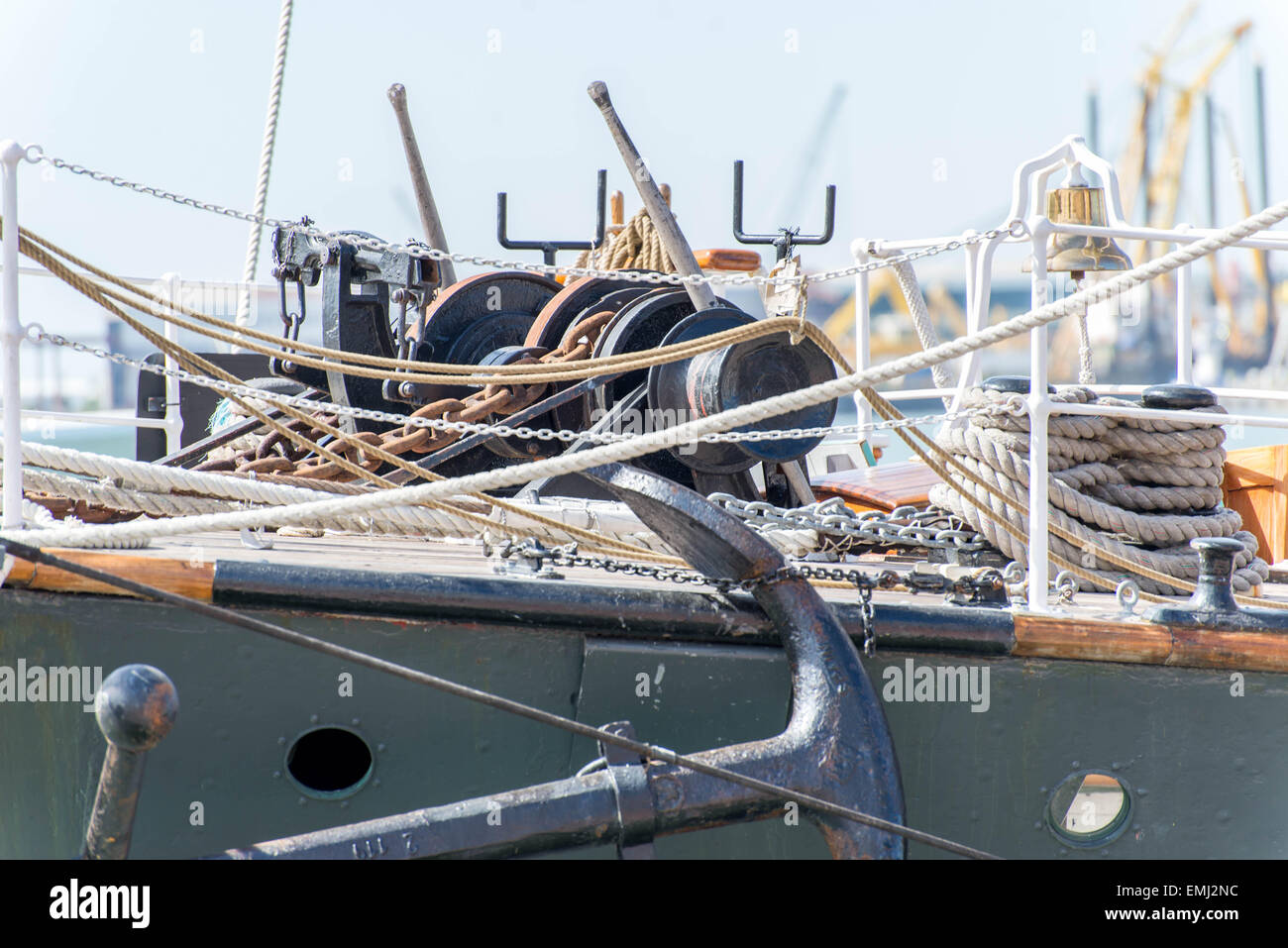 masts, rigging and rolled up sails of a tall sailboat Stock Photo - Alamy