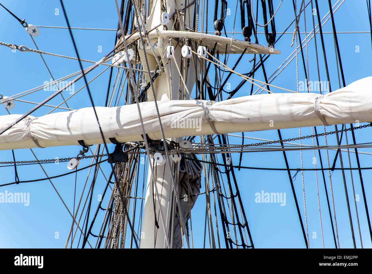 Masts rigging rolled up sails hi-res stock photography and images - Alamy