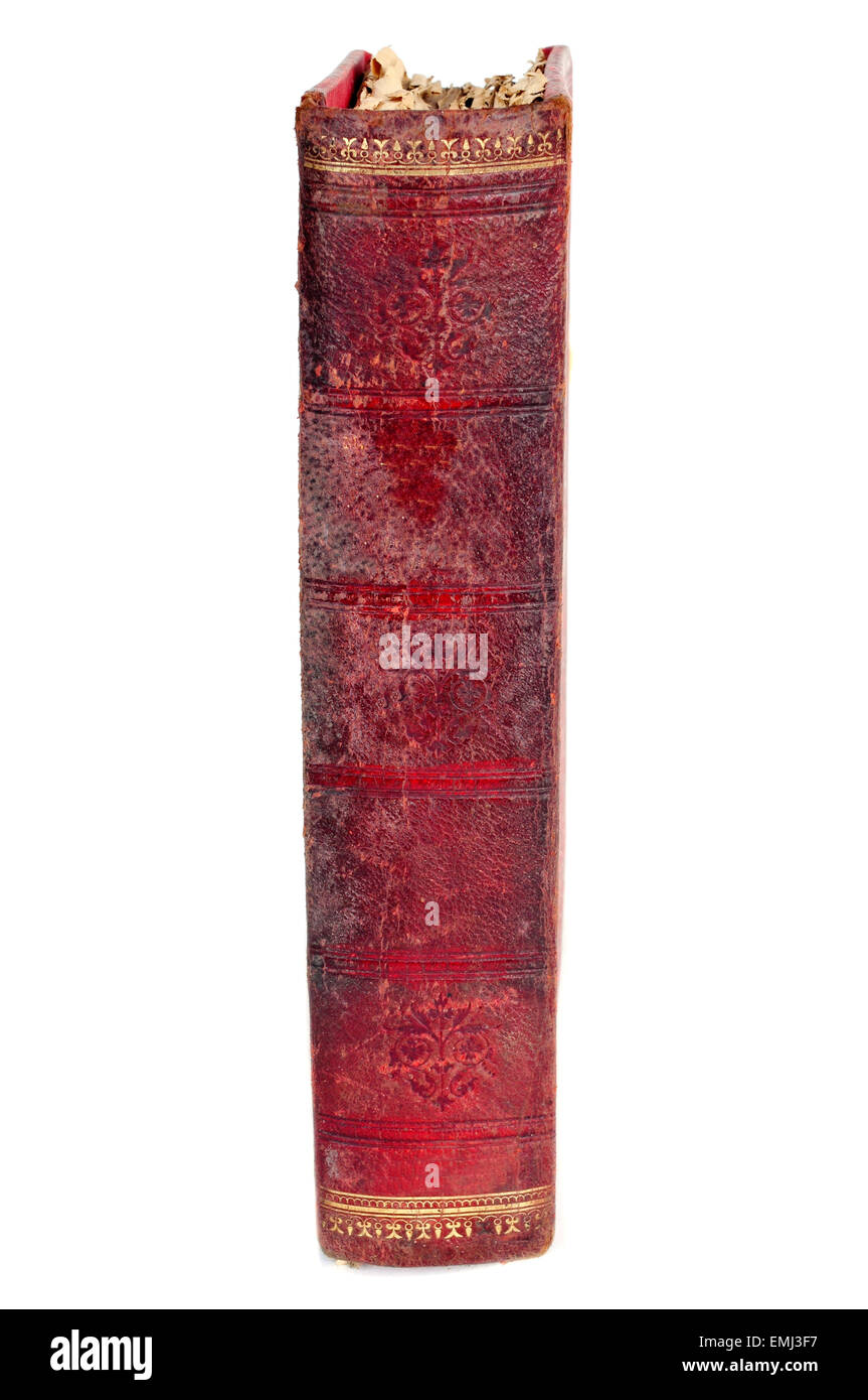 a worn-out old book with a red cover on a white background Stock Photo ...