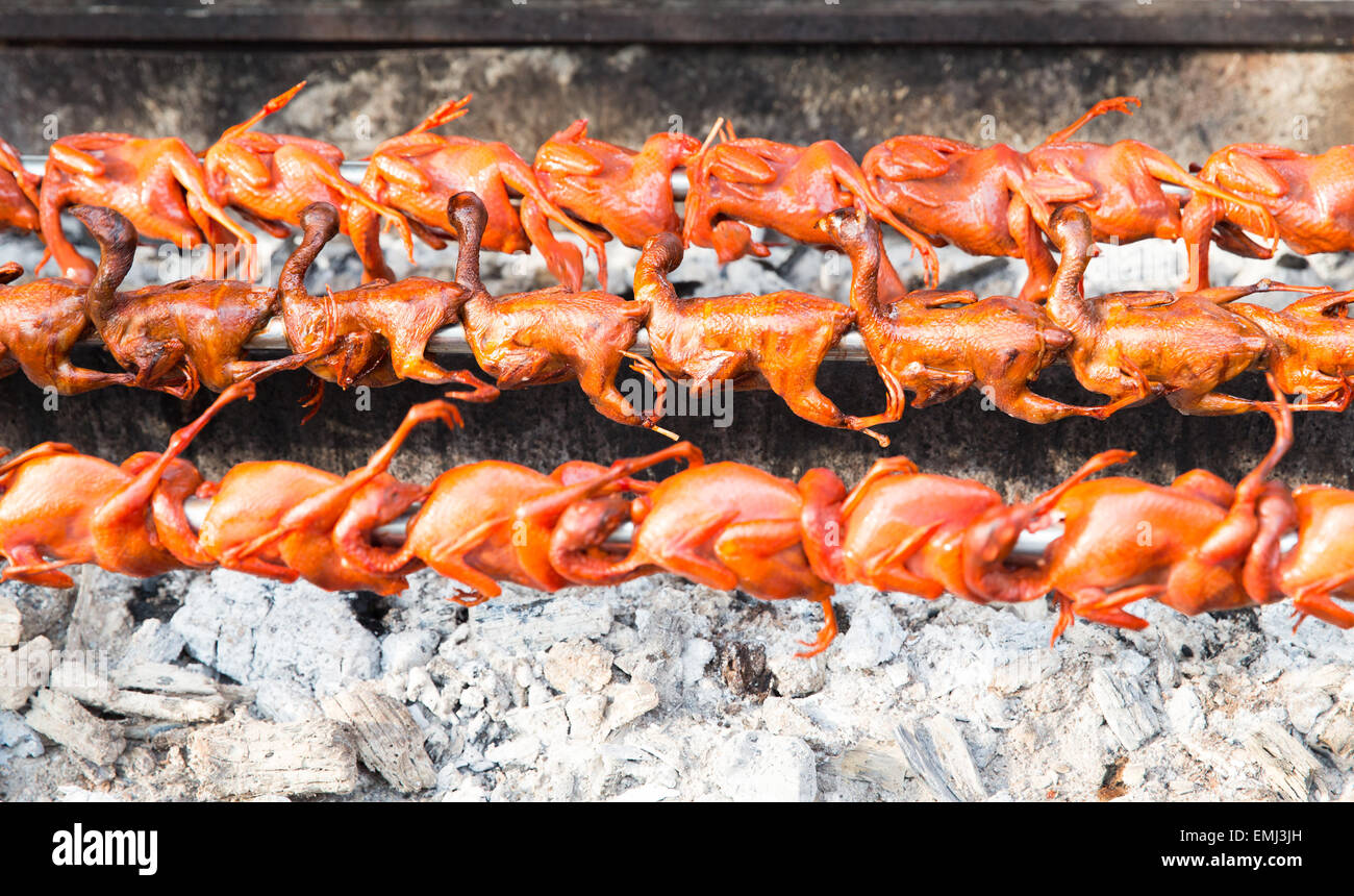 quail grill on street market Stock Photo - Alamy