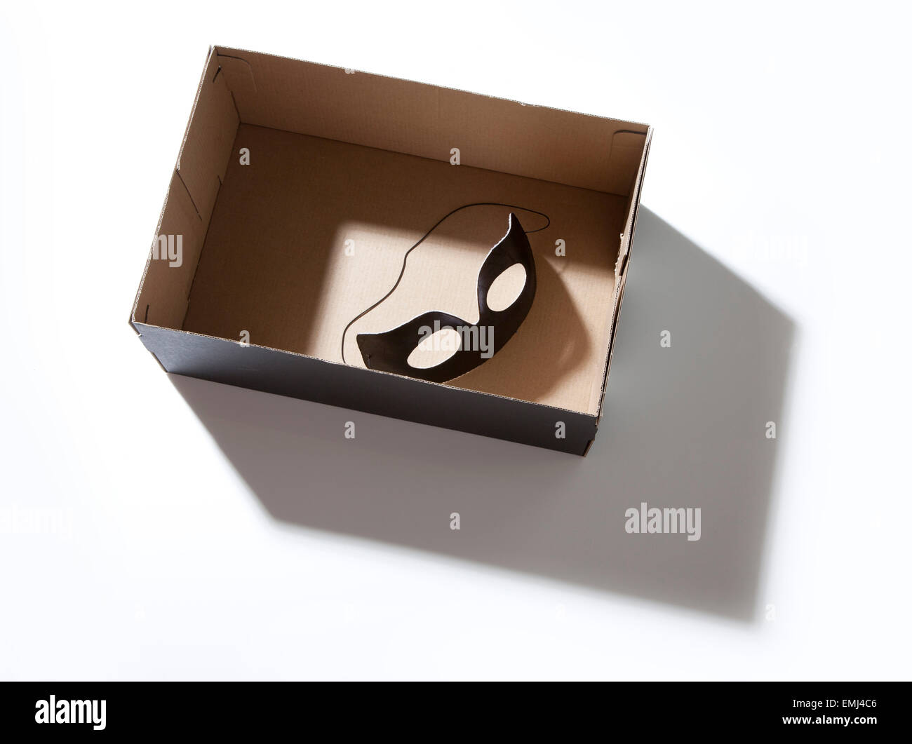 Cardboard face mask Cut Out Stock Images & Pictures - Alamy