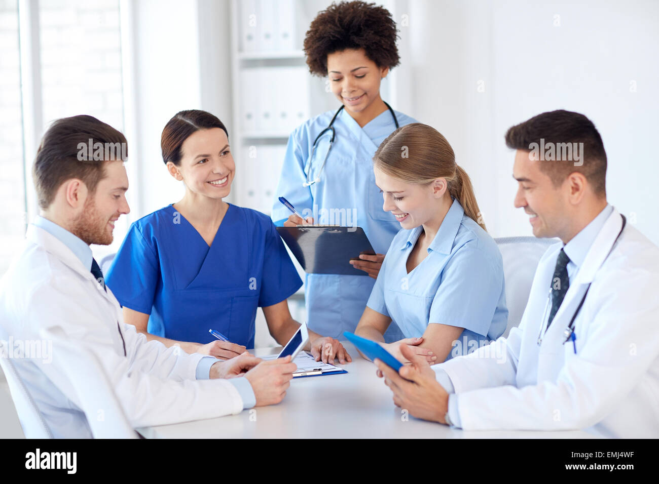 group of happy doctors meeting at hospital office Stock Photo - Alamy