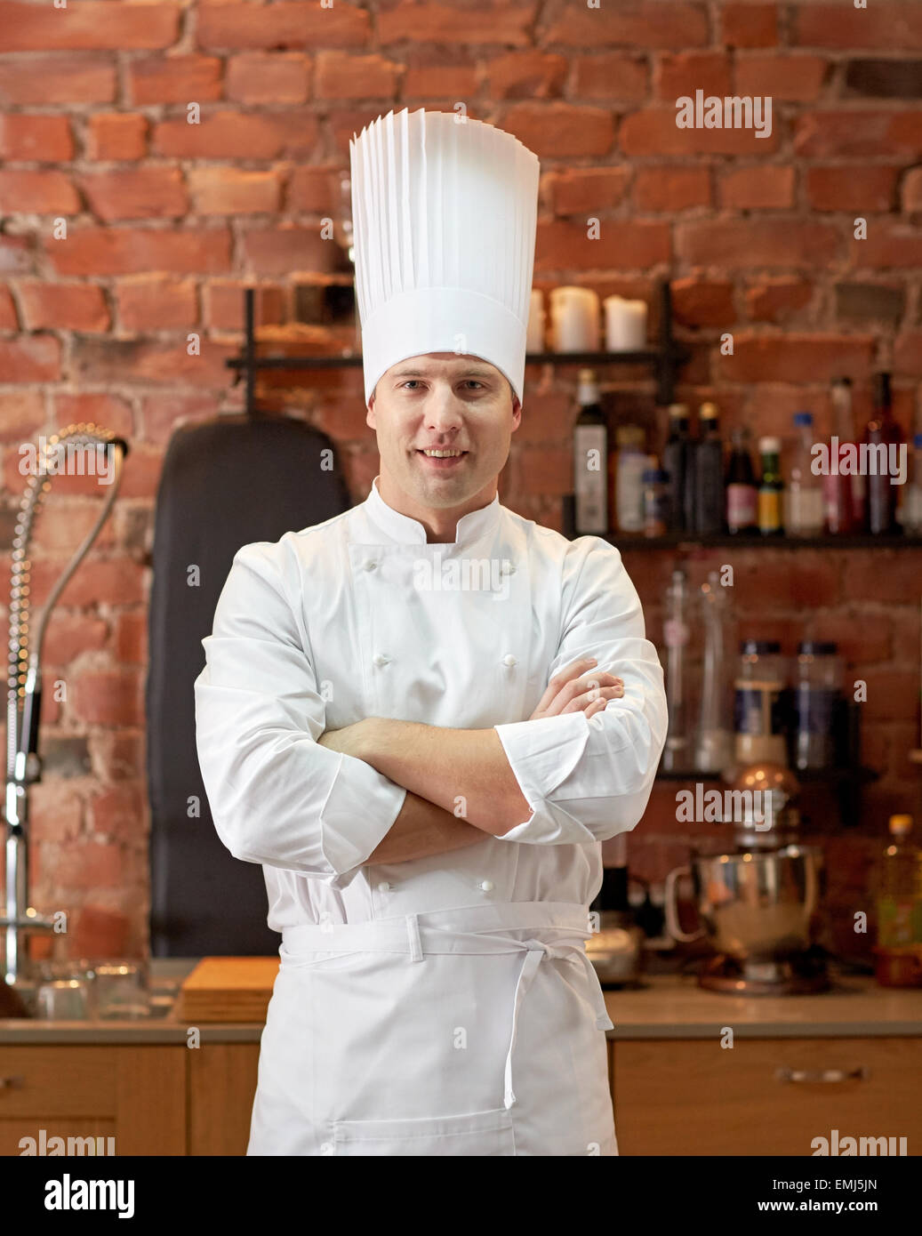 happy male chef cook in restaurant kitchen Stock Photo - Alamy