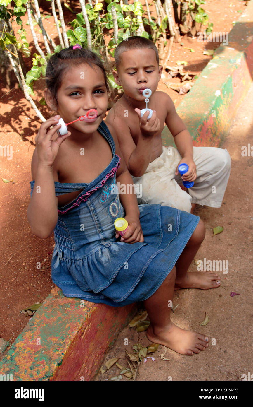 Two Cuban children blowing bubbles Zapata Peninsula Cuba Stock Photo ...