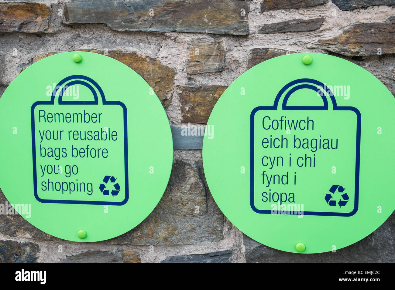 Outside Co-op store signs in English and Welsh encouraging customers to ...