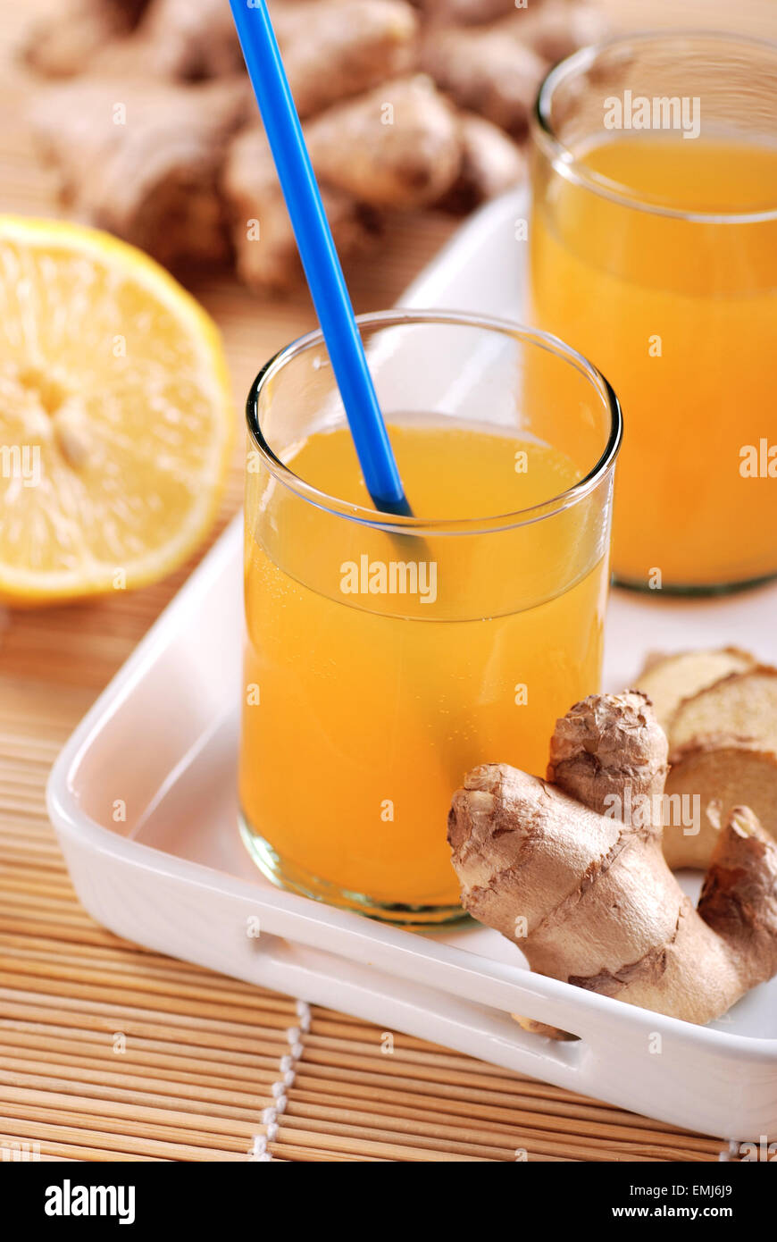 lemon juice and ginger in glass beaker Stock Photo - Alamy