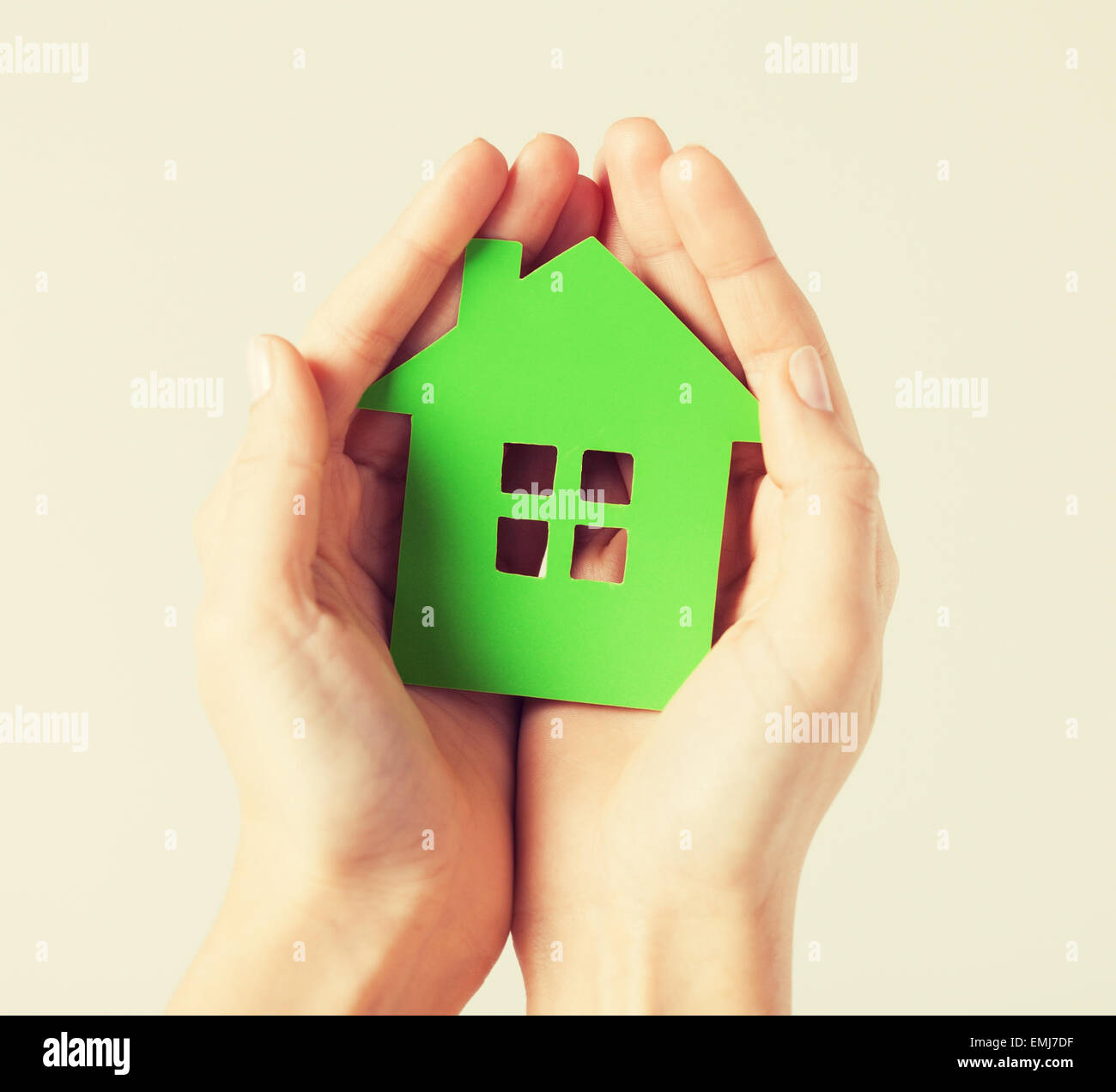 hands holding green house Stock Photo - Alamy