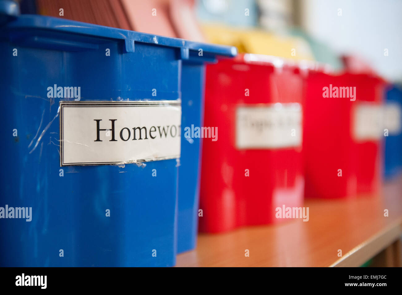Blue boxes marked, homework in a UK school classroom Stock Photo - Alamy
