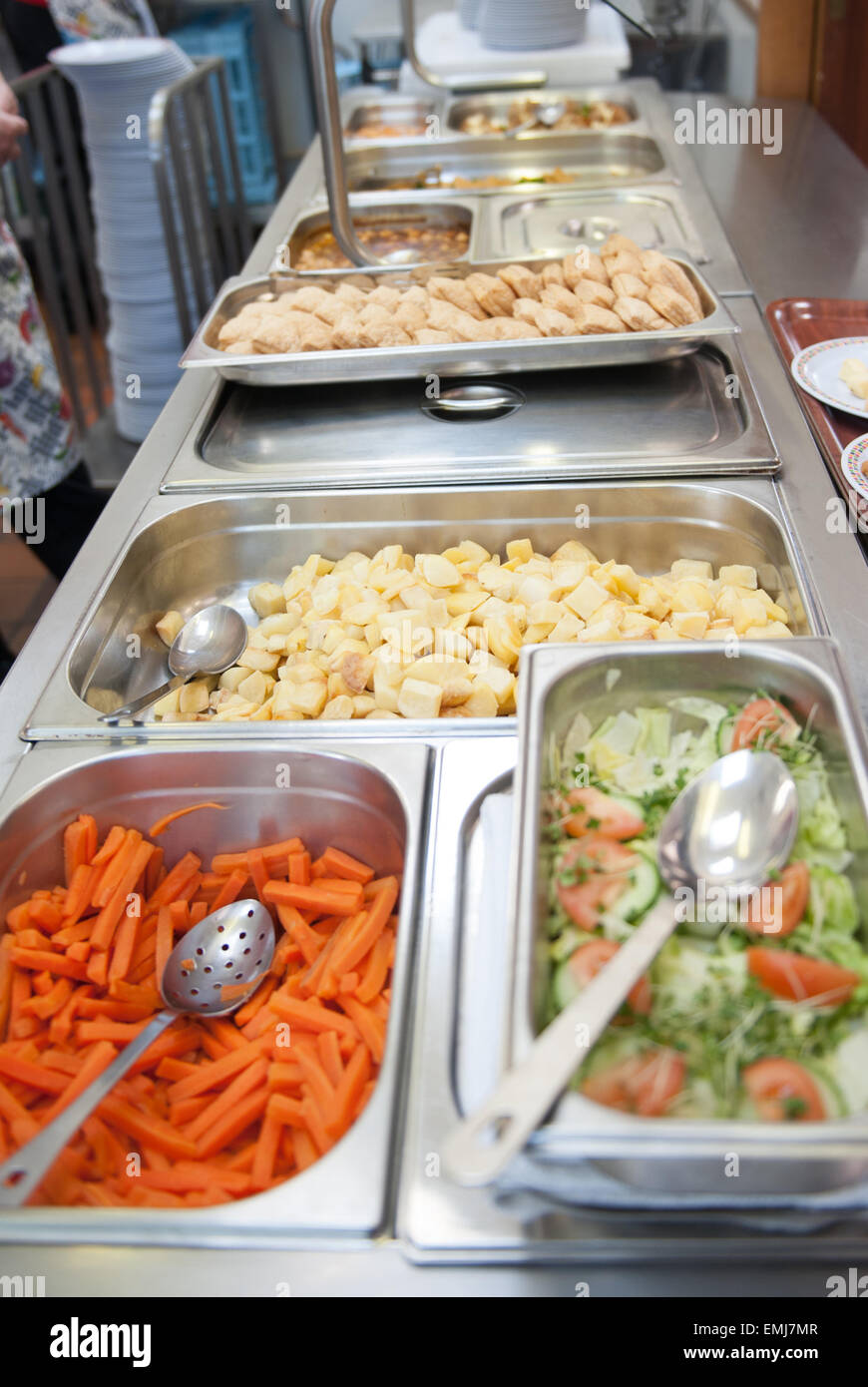 Dinner ladies prepare school meals in the primary school canteen Stock ...