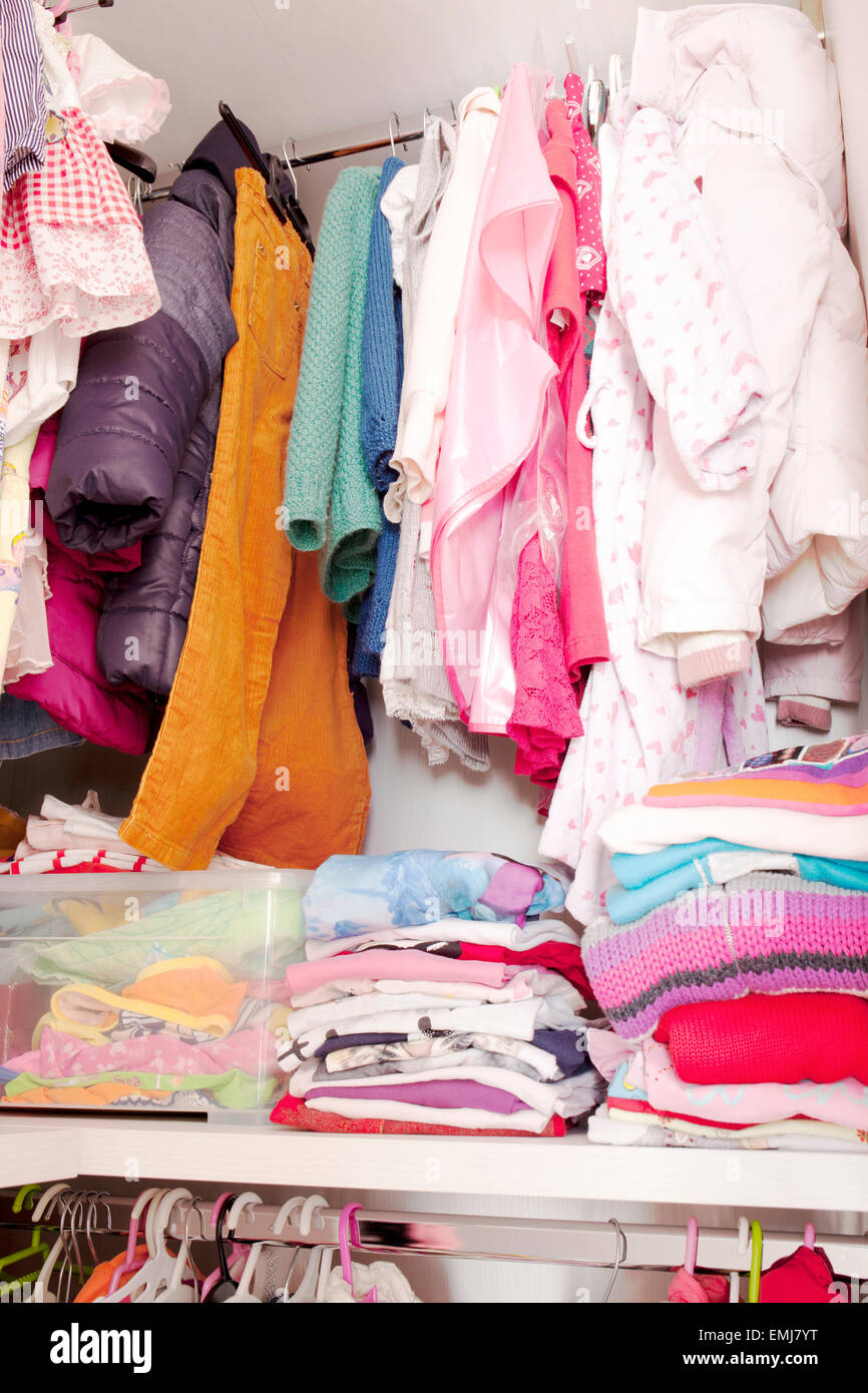 Wardrobe with child clothes Stock Photo - Alamy