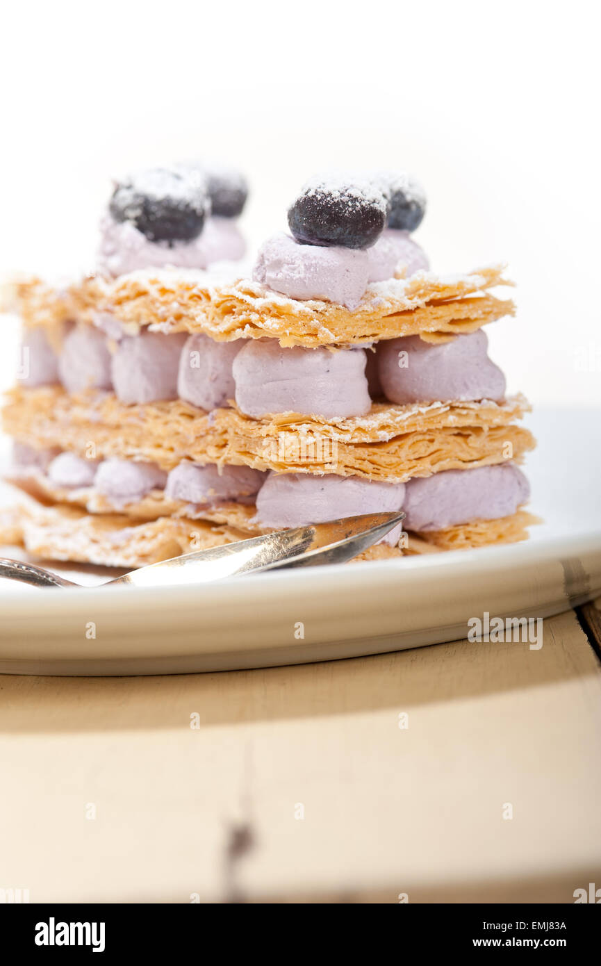 fresh baked napoleon blueberry and cream cake dessert Stock Photo - Alamy