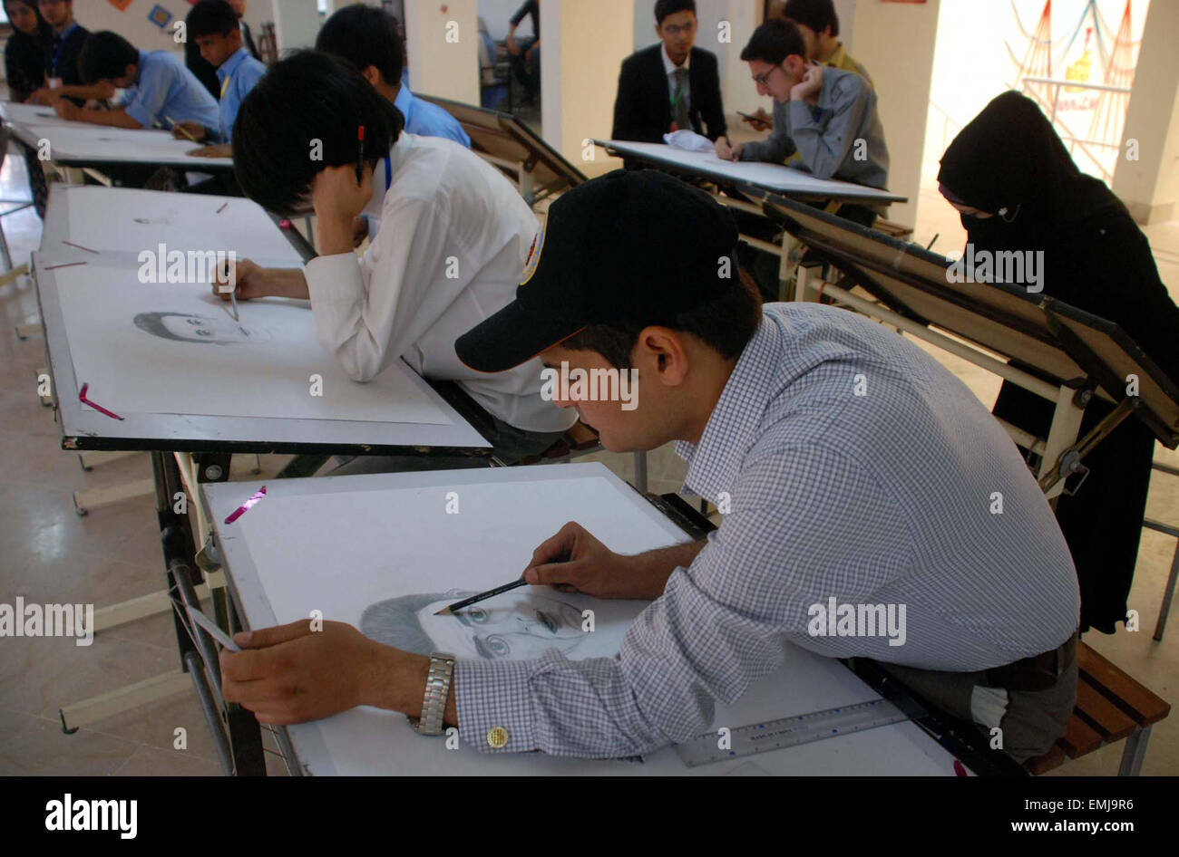 Students participate in competition during Art Exhibition organized by ...