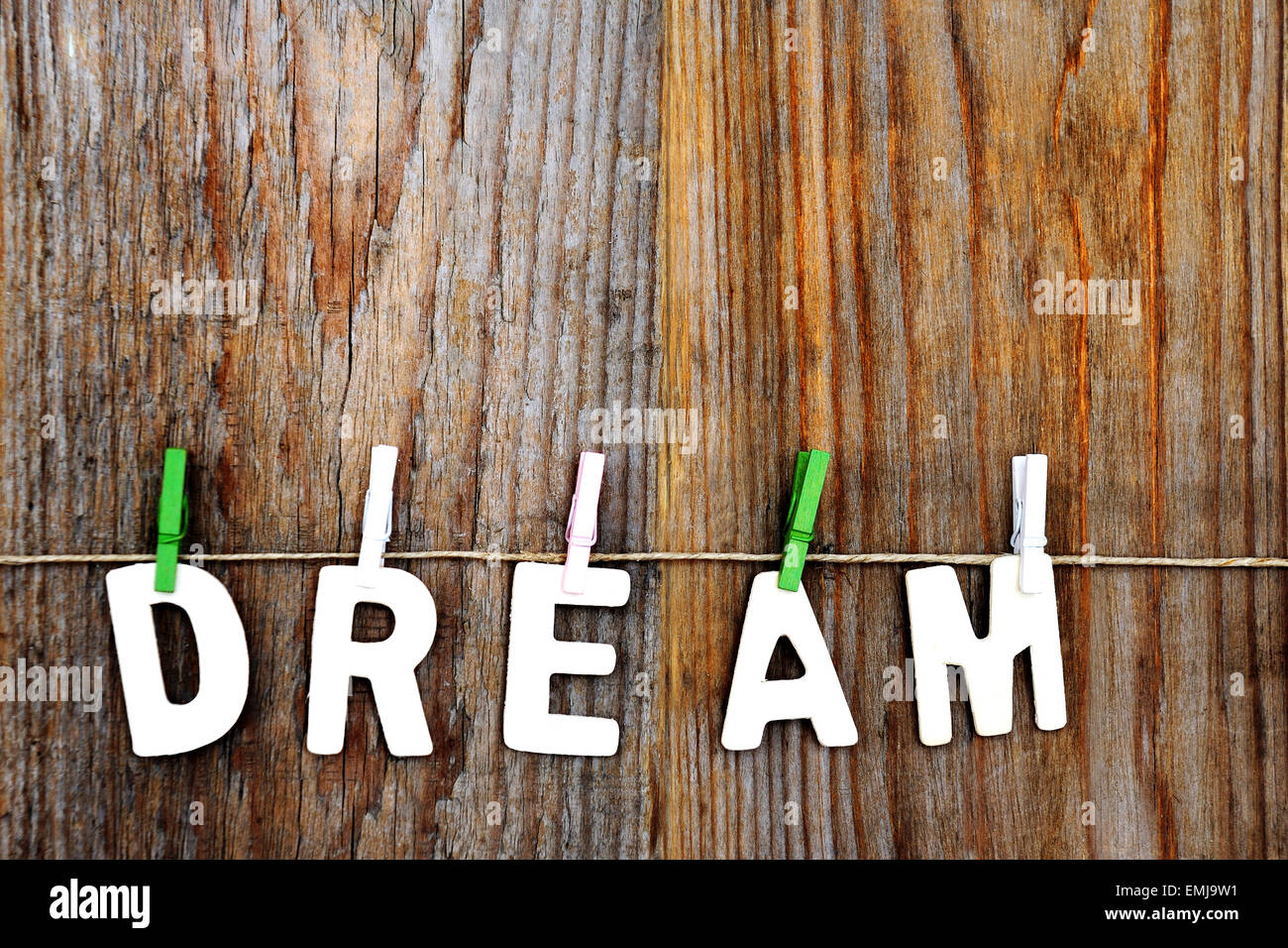 dream word on brown wooden background Stock Photo - Alamy