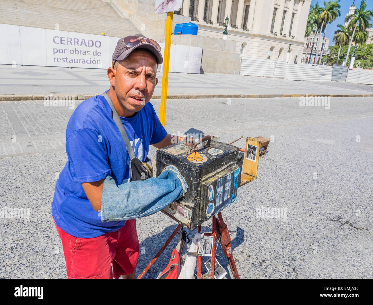 A Cuban Hispanic man who makes his living photographing tourists in ...