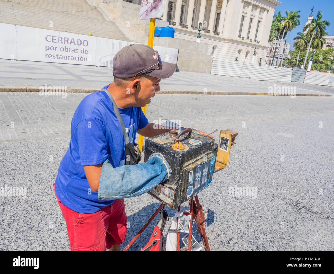 A Cuban Hispanic man who makes his living photographing tourists in ...