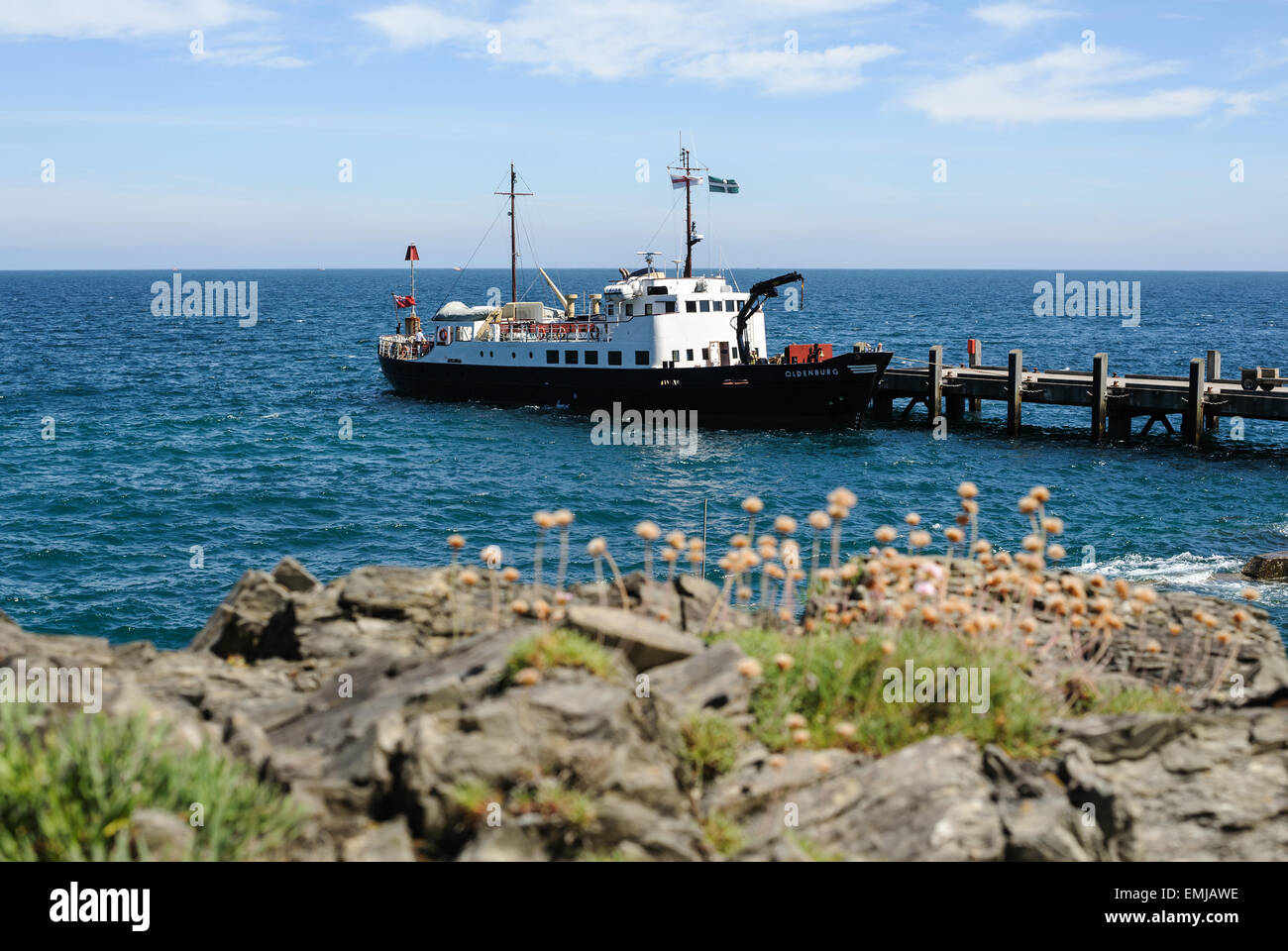 The passenger ferry MS Oldenburg docked at the pier on the island of ...