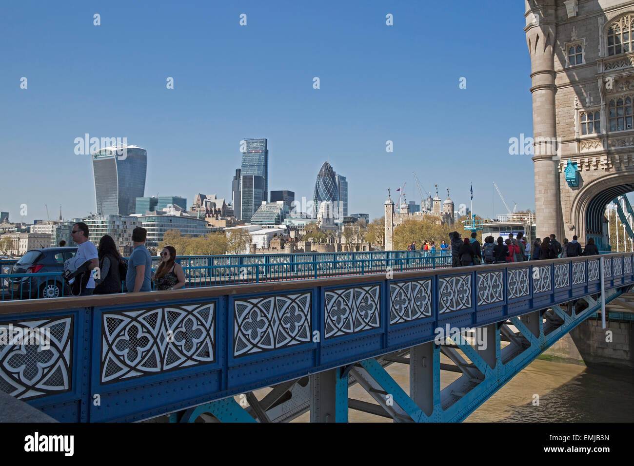 Pedestrians walk over Tower Bridge in London Stock Photo - Alamy
