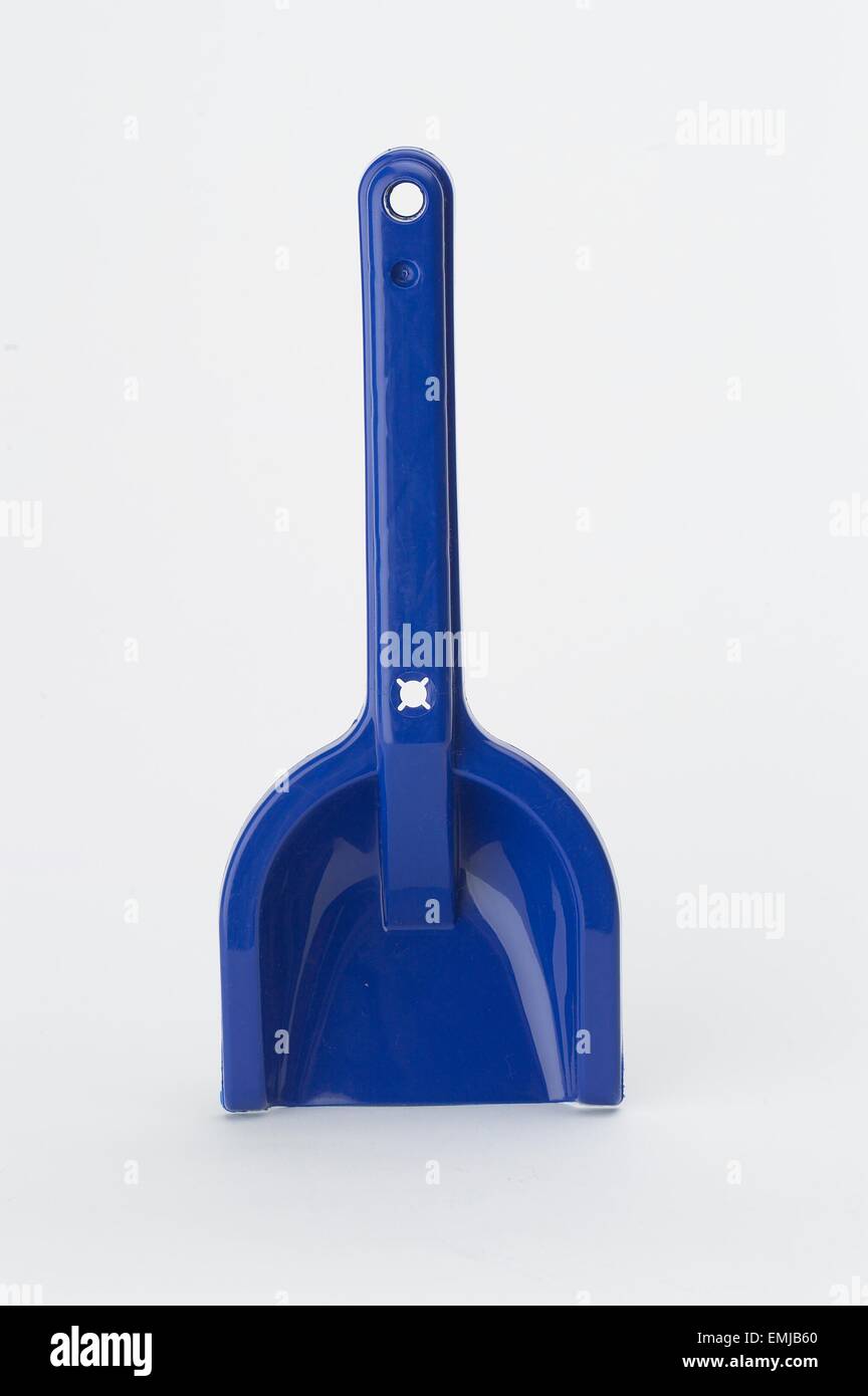 Plastic blue spade on white background Stock Photo - Alamy