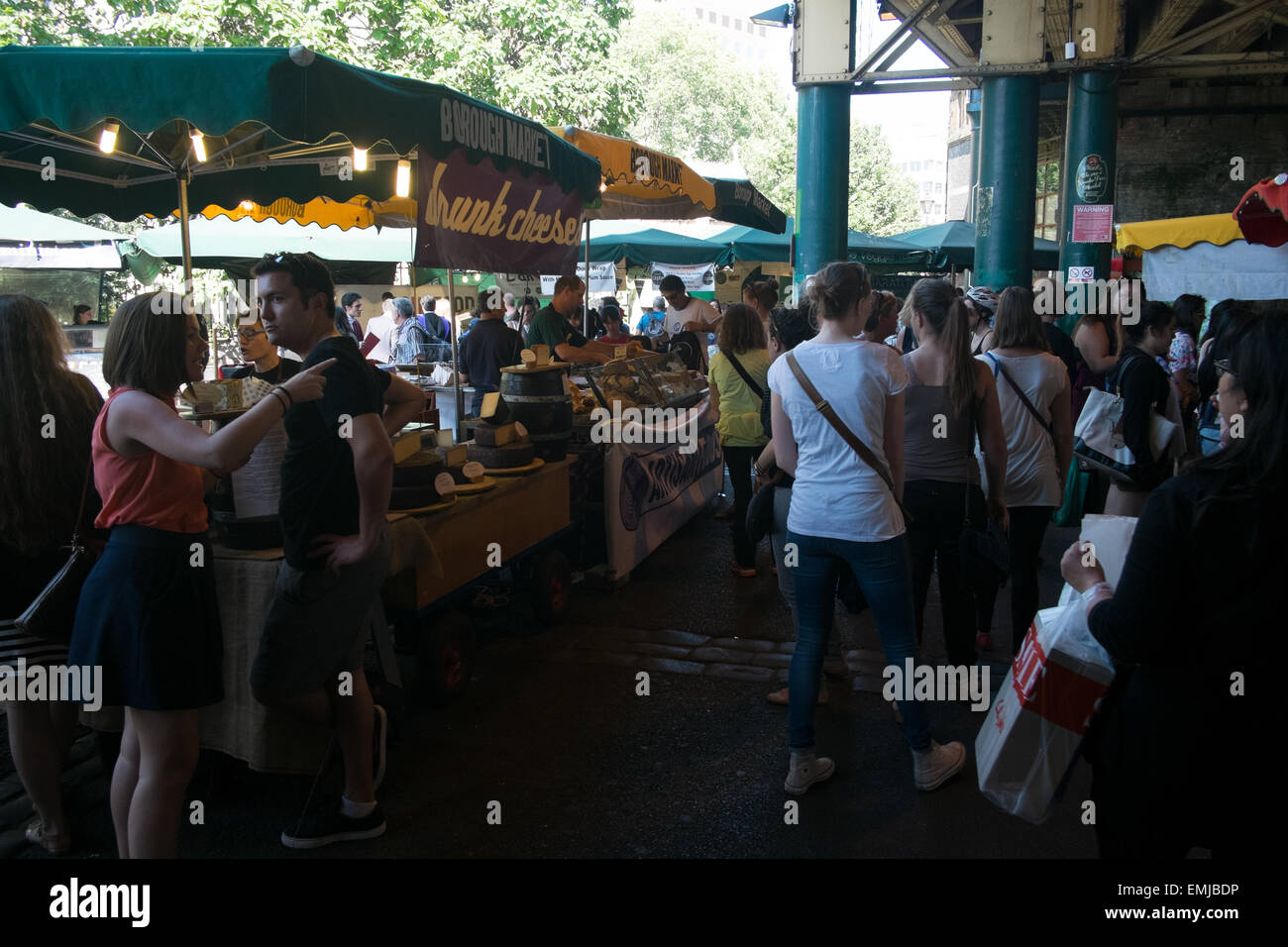 People walking around the market Stock Photo - Alamy