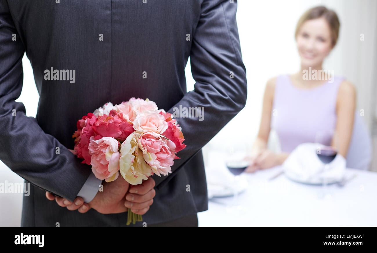 Hiding behind flowers hi-res stock photography and images - Alamy