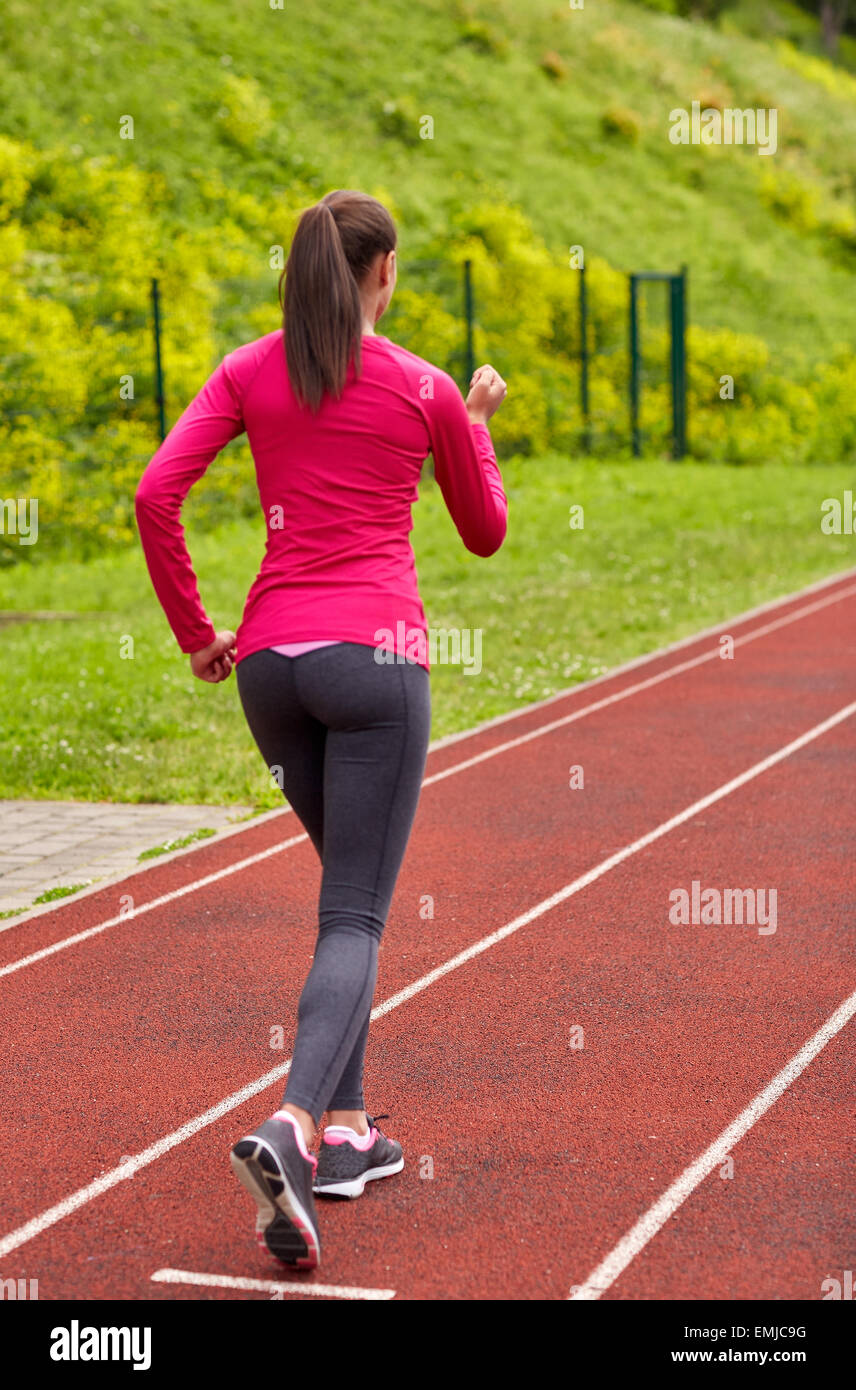 Track athlete from rear hi-res stock photography and images - Alamy