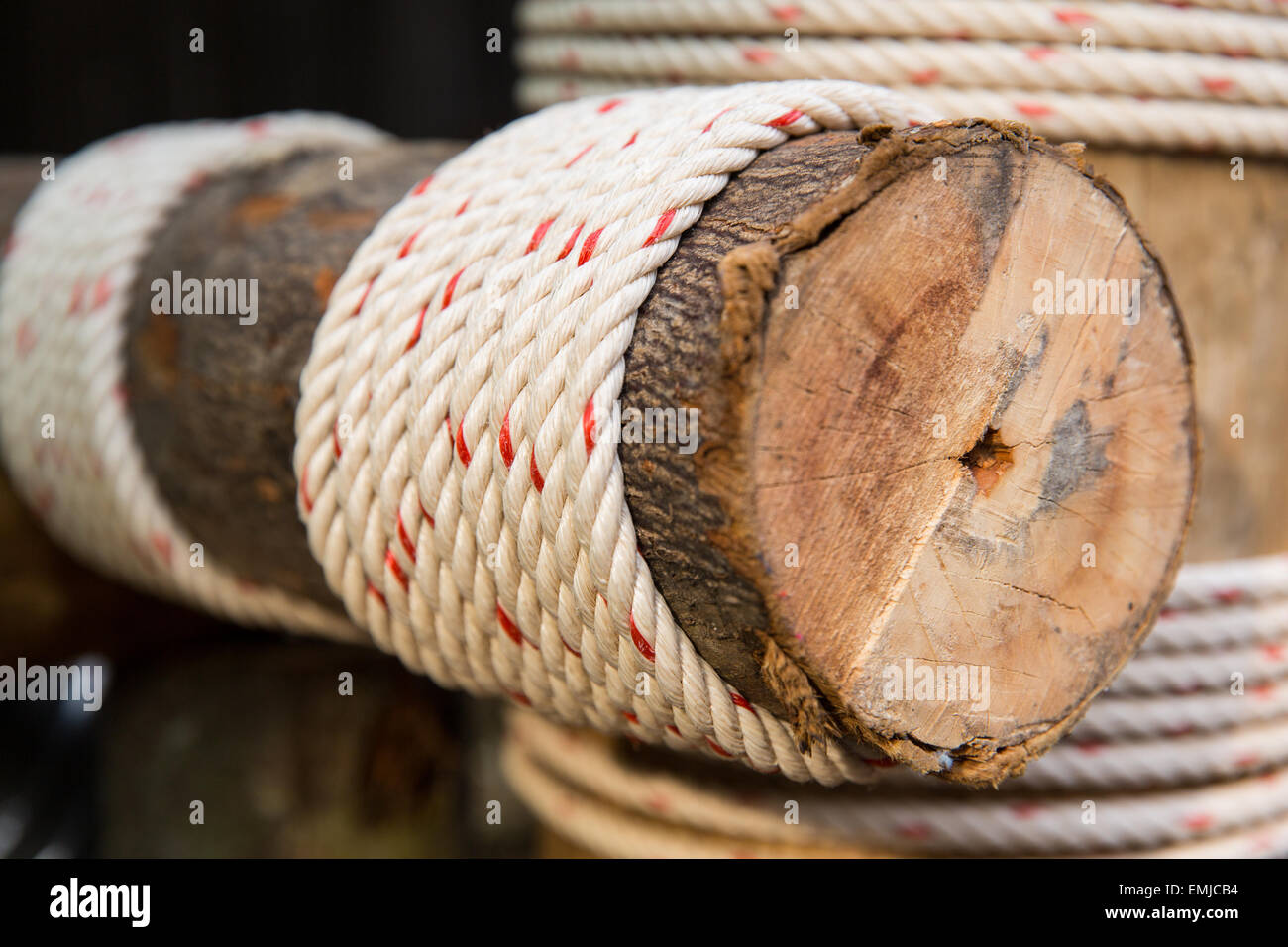 wooden beam wrapped with rope Stock Photo - Alamy