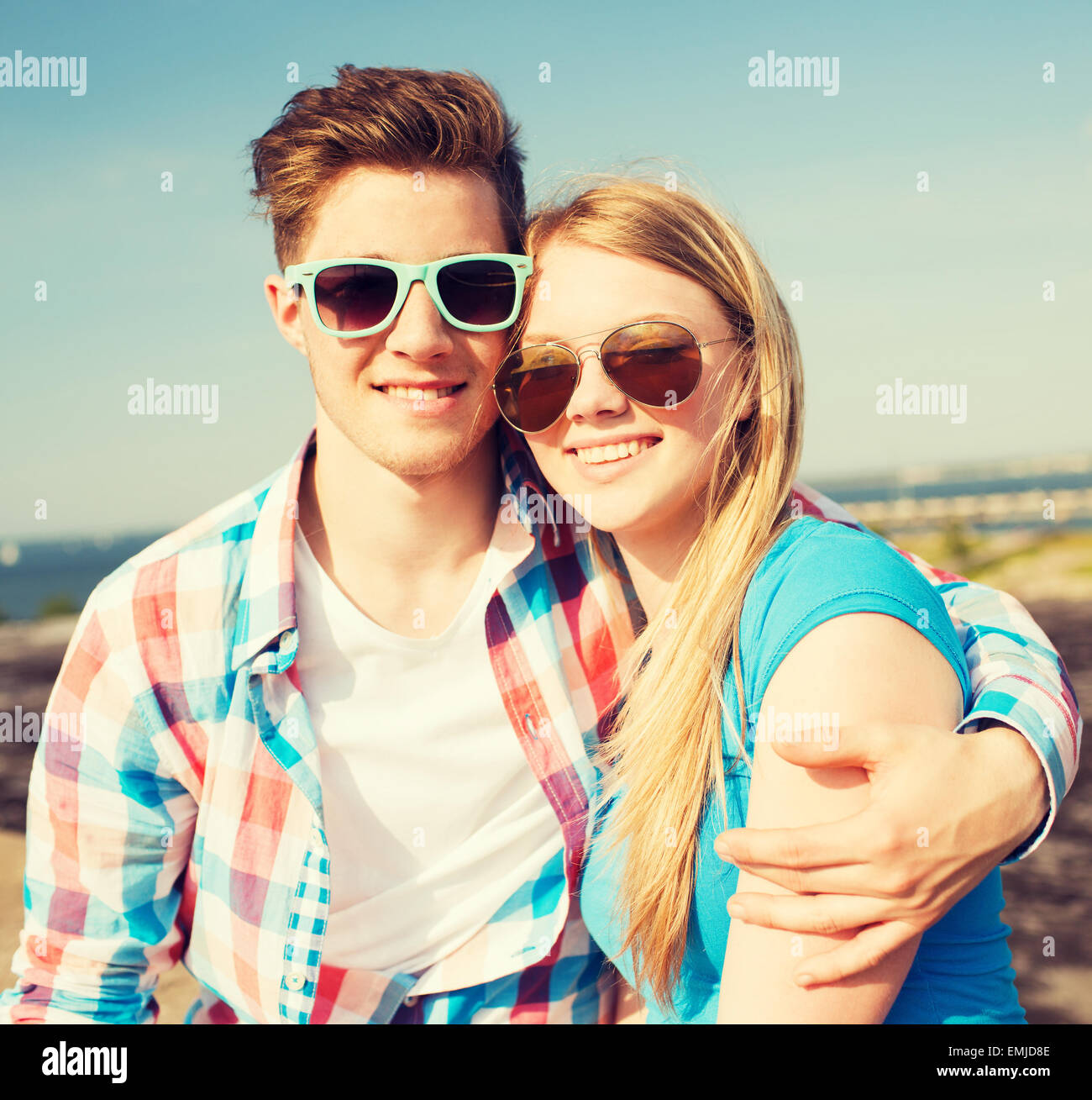 smiling couple having fun outdoors Stock Photo - Alamy