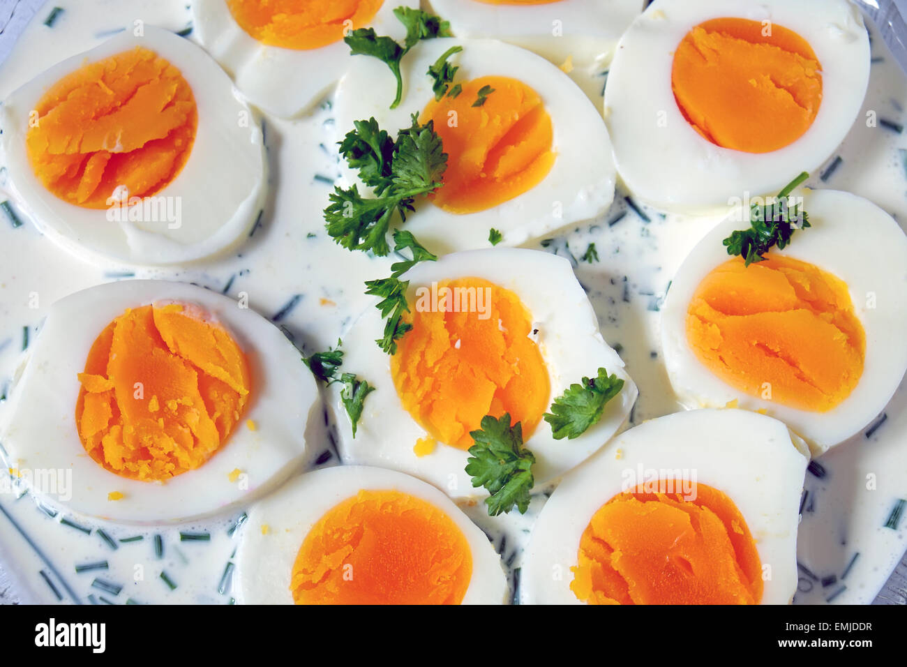 Boiled and sliced eggs seen on a buffet Stock Photo - Alamy